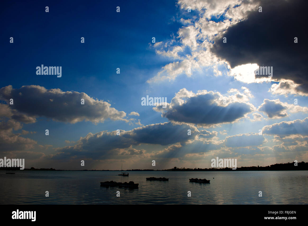 Clouds over the lake Stock Photo - Alamy