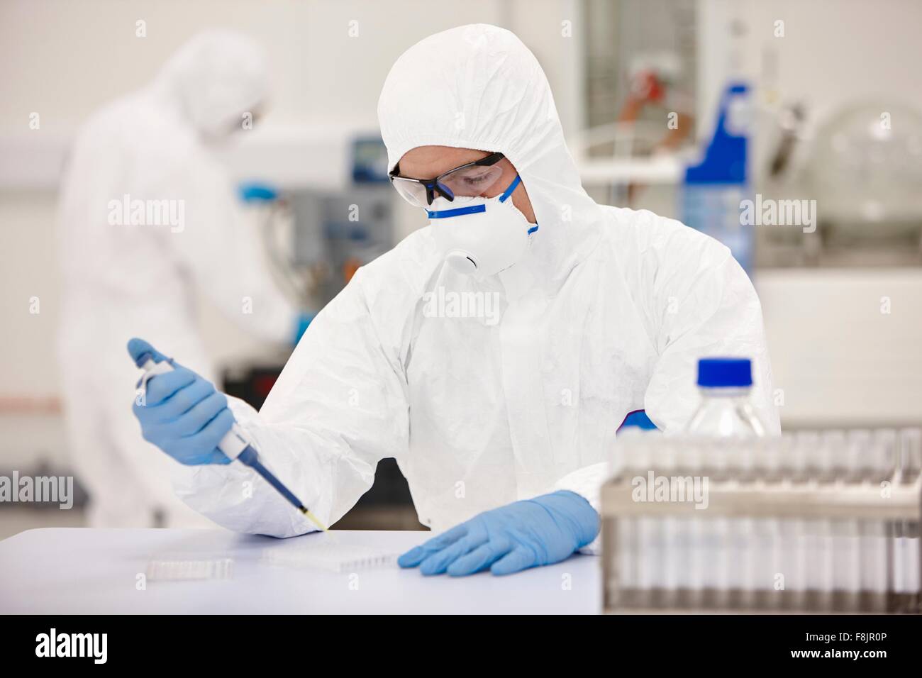 Scientists working in laboratory Stock Photo - Alamy