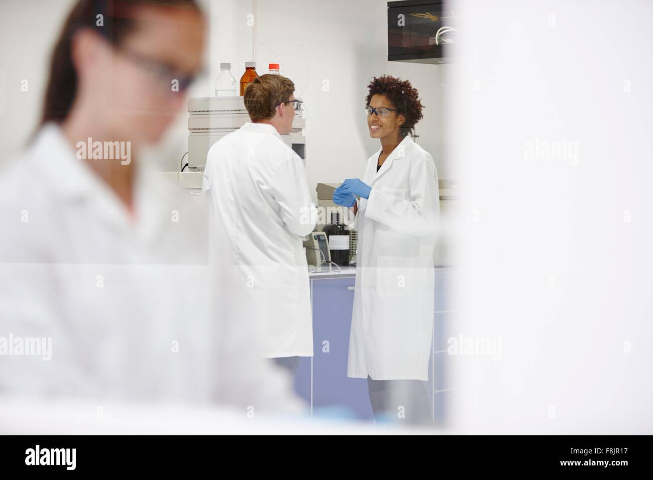 Scientists working in laboratory Stock Photo - Alamy