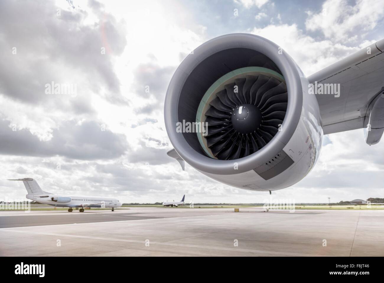 View of A380 aircraft jet engine and planes on runway Stock Photo - Alamy
