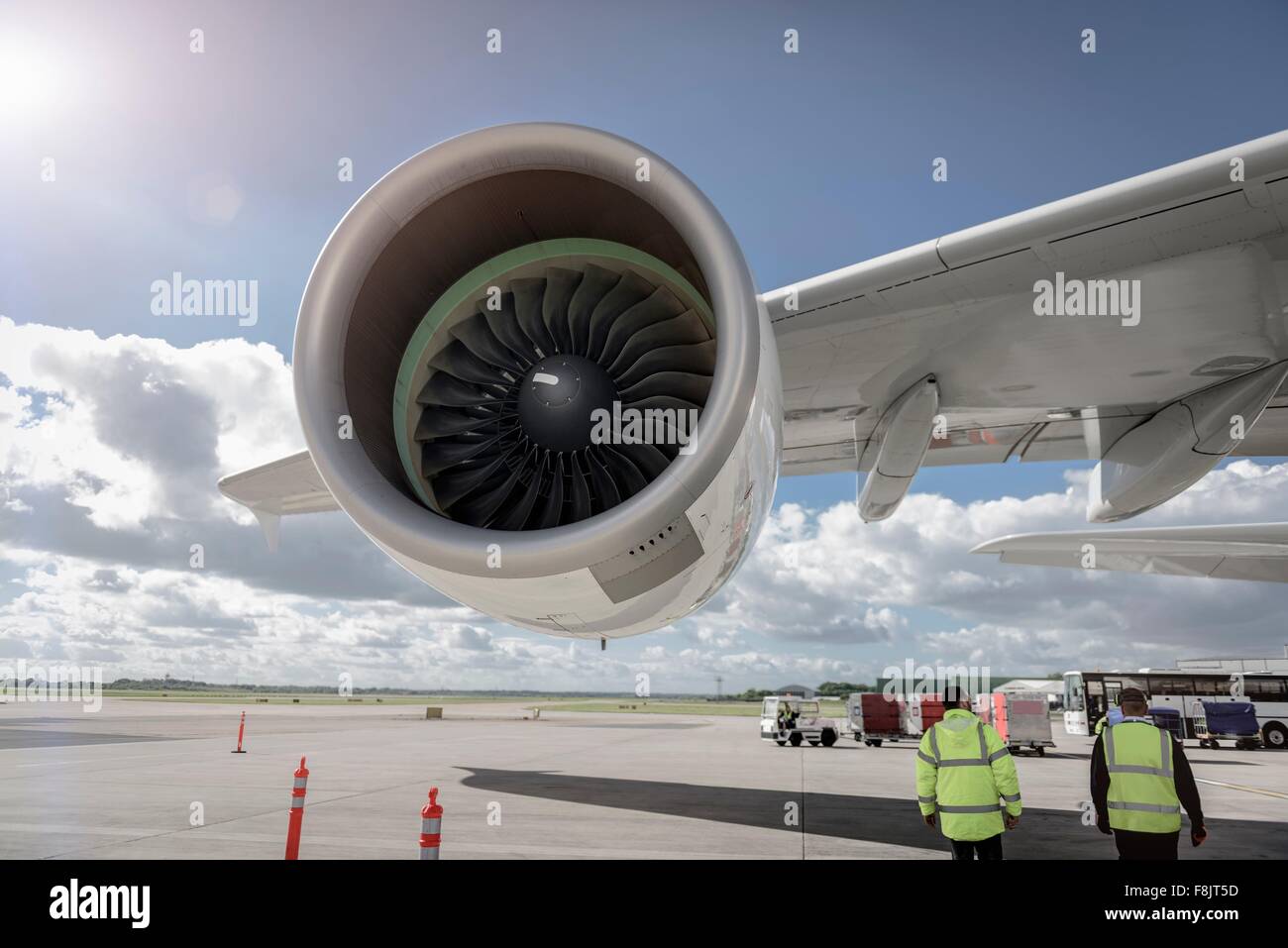 Ground crew with A380 jet engine aircraft Stock Photo - Alamy