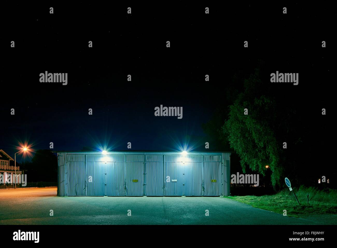 Garage with spotlights at night, Kalmar, Sweden Stock Photo - Alamy