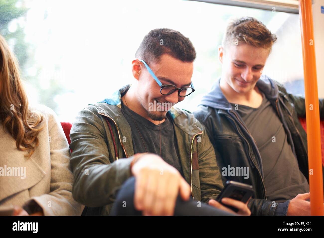 Two men sitting in train hi-res stock photography and images - Alamy