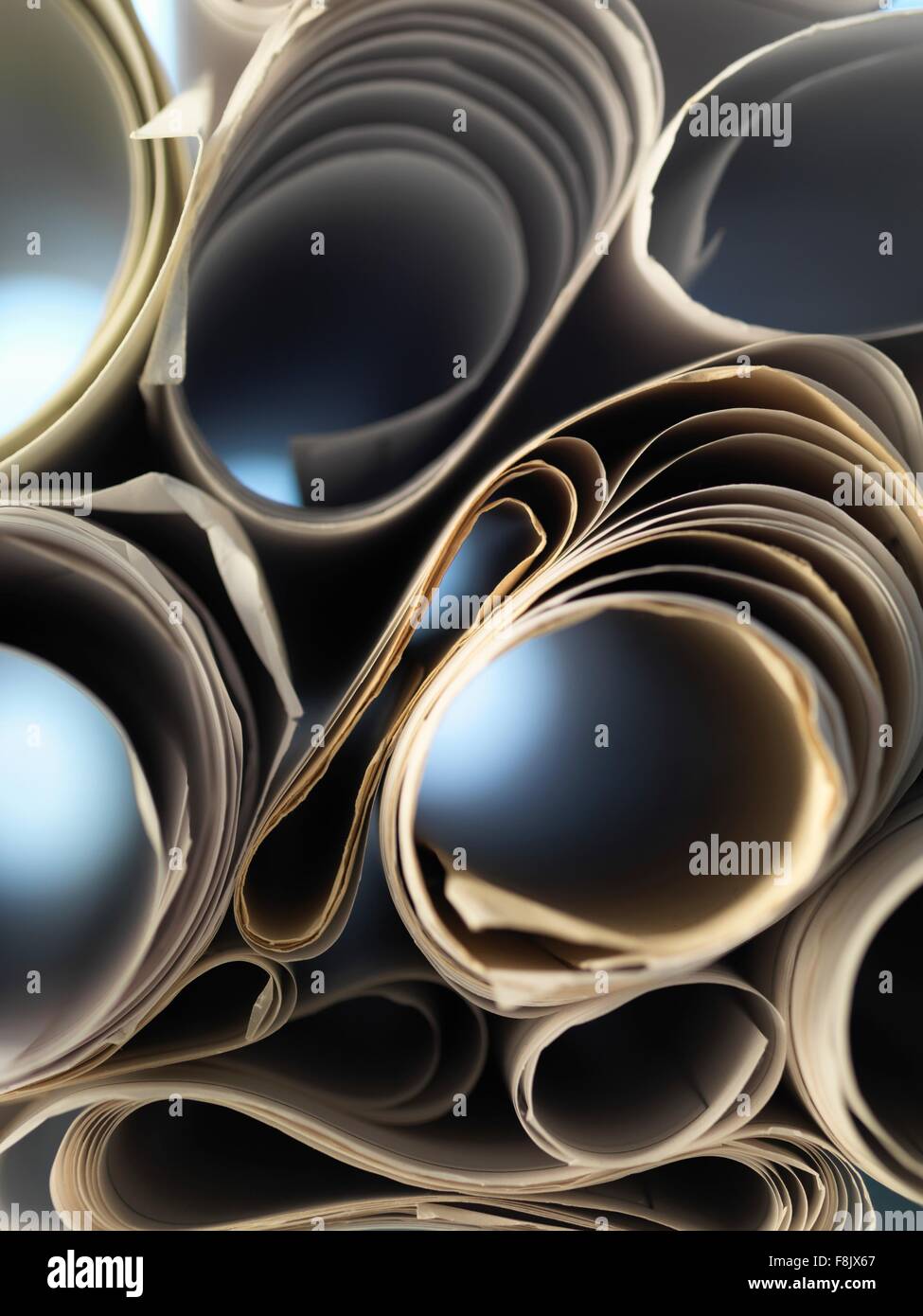 Full frame view through rolled up architectural drawings Stock Photo ...
