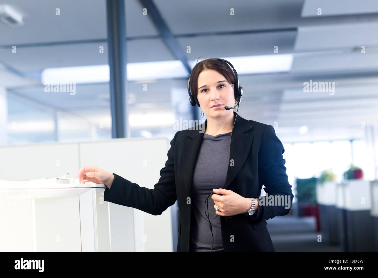 Telephonist in office Stock Photo - Alamy