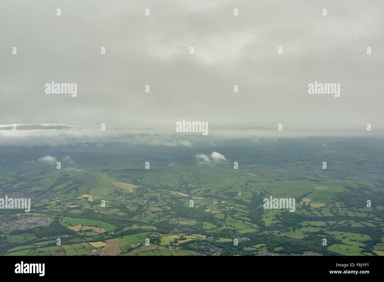 Aerial view of low cloud and distant green fields, England. UK Stock ...