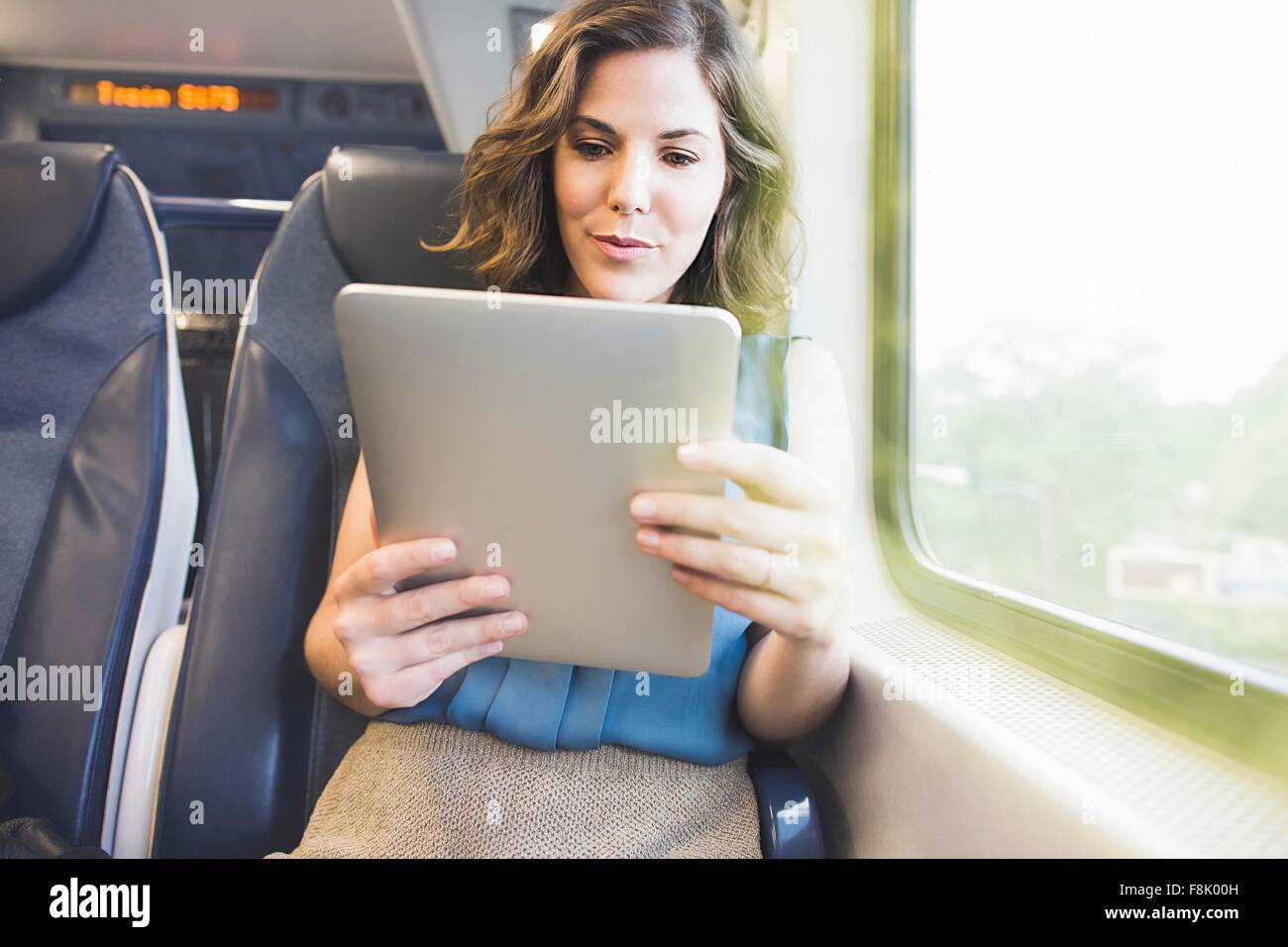 Business woman on train hi-res stock photography and images - Alamy