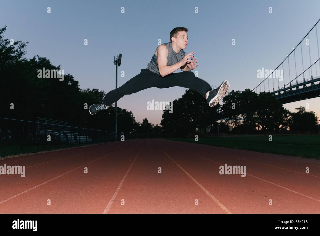 Young Man Jumping High Resolution Stock Photography and Images - Alamy