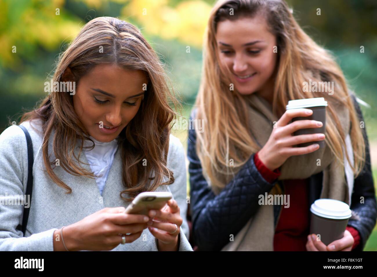 Female reading outdoors hi-res stock photography and images - Alamy