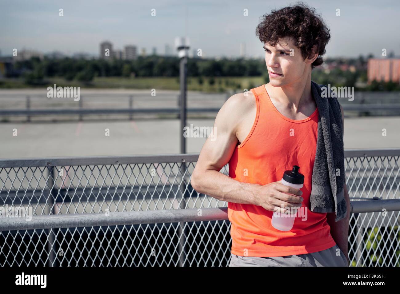 Man looking over shoulder running hi-res stock photography and images ...