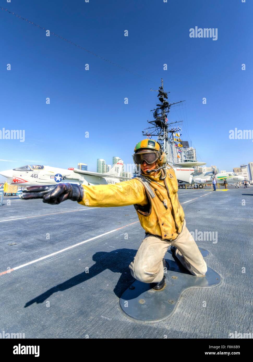 A statue of a Flight Deck Director, catapult officer, signalling ...