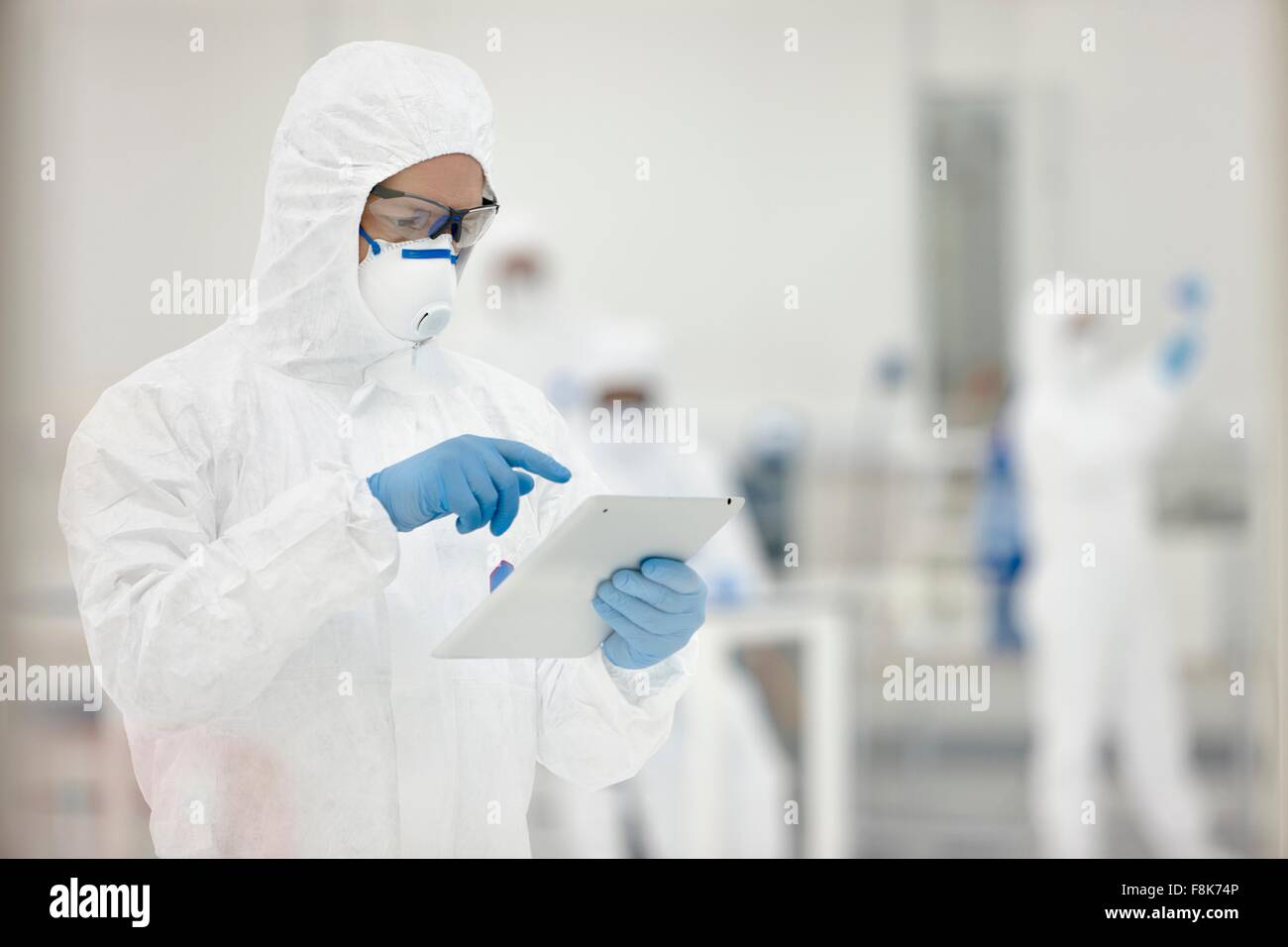 Scientists working in laboratory Stock Photo - Alamy