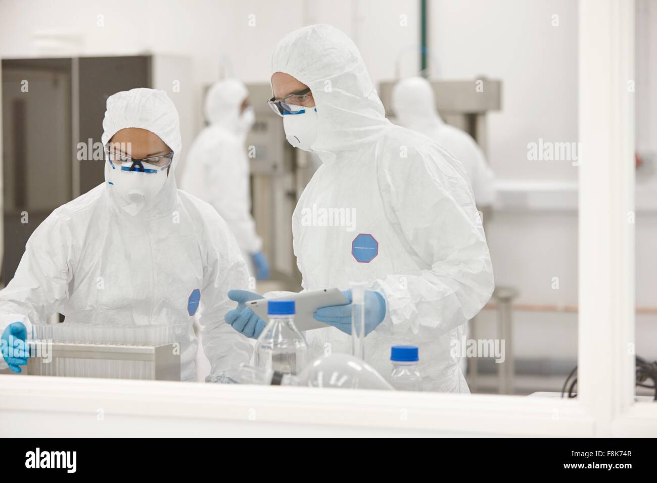 Scientists working in laboratory Stock Photo - Alamy