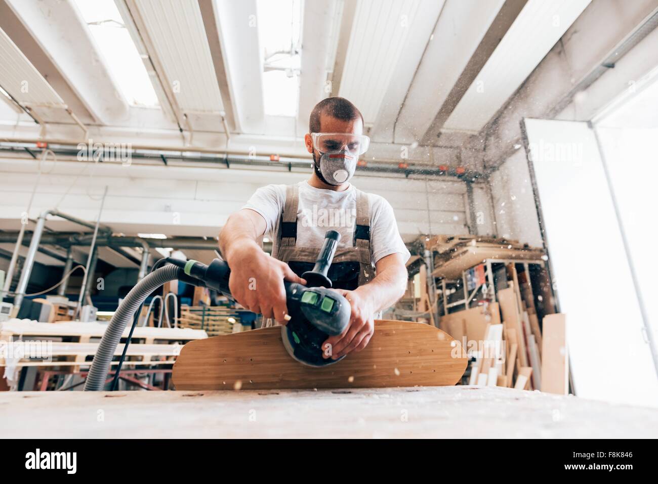 Man sanding hi-res stock photography and images - Alamy