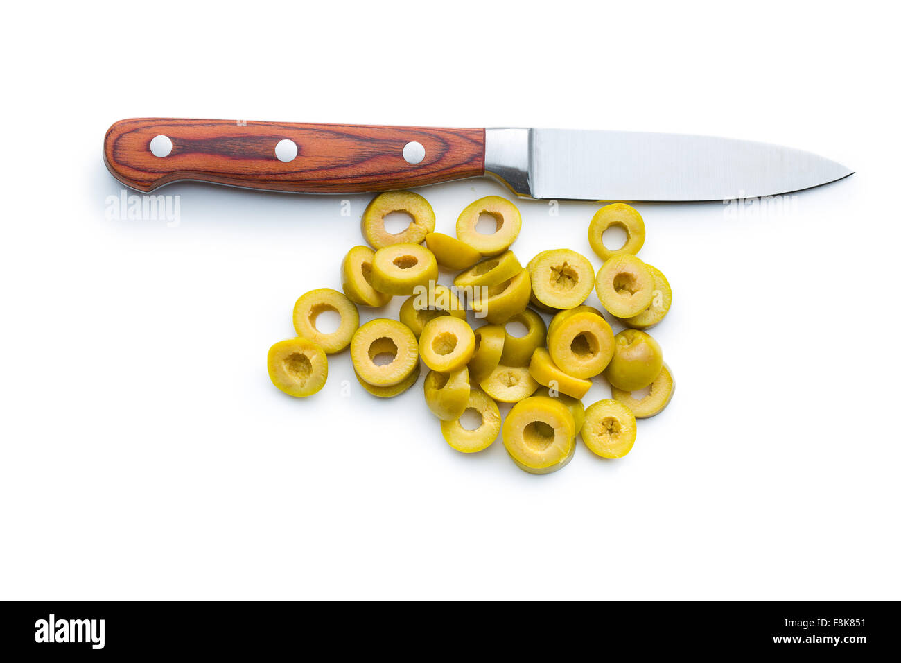 sliced green olives on white background Stock Photo - Alamy