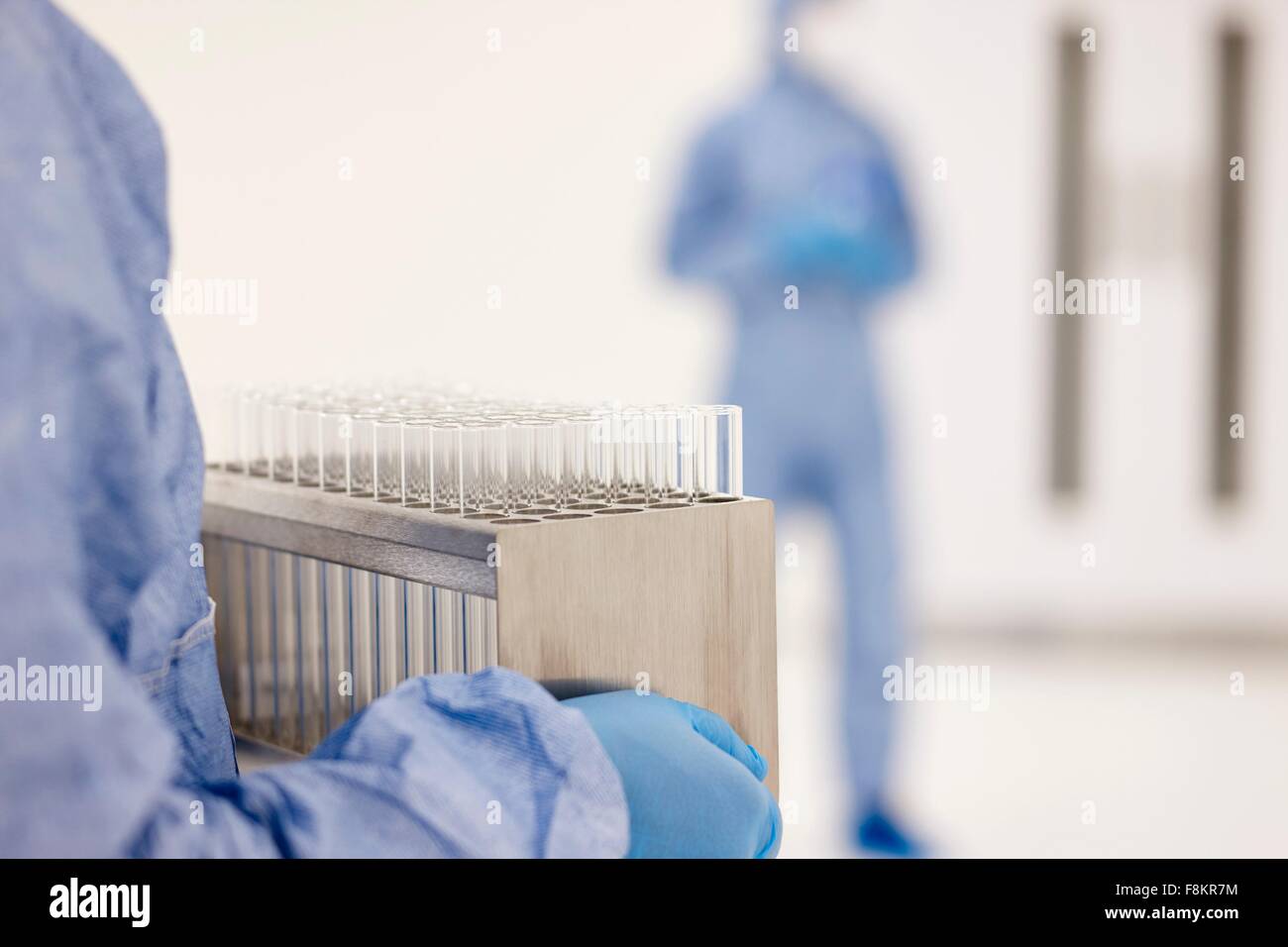 People carrying tubes hi-res stock photography and images - Alamy