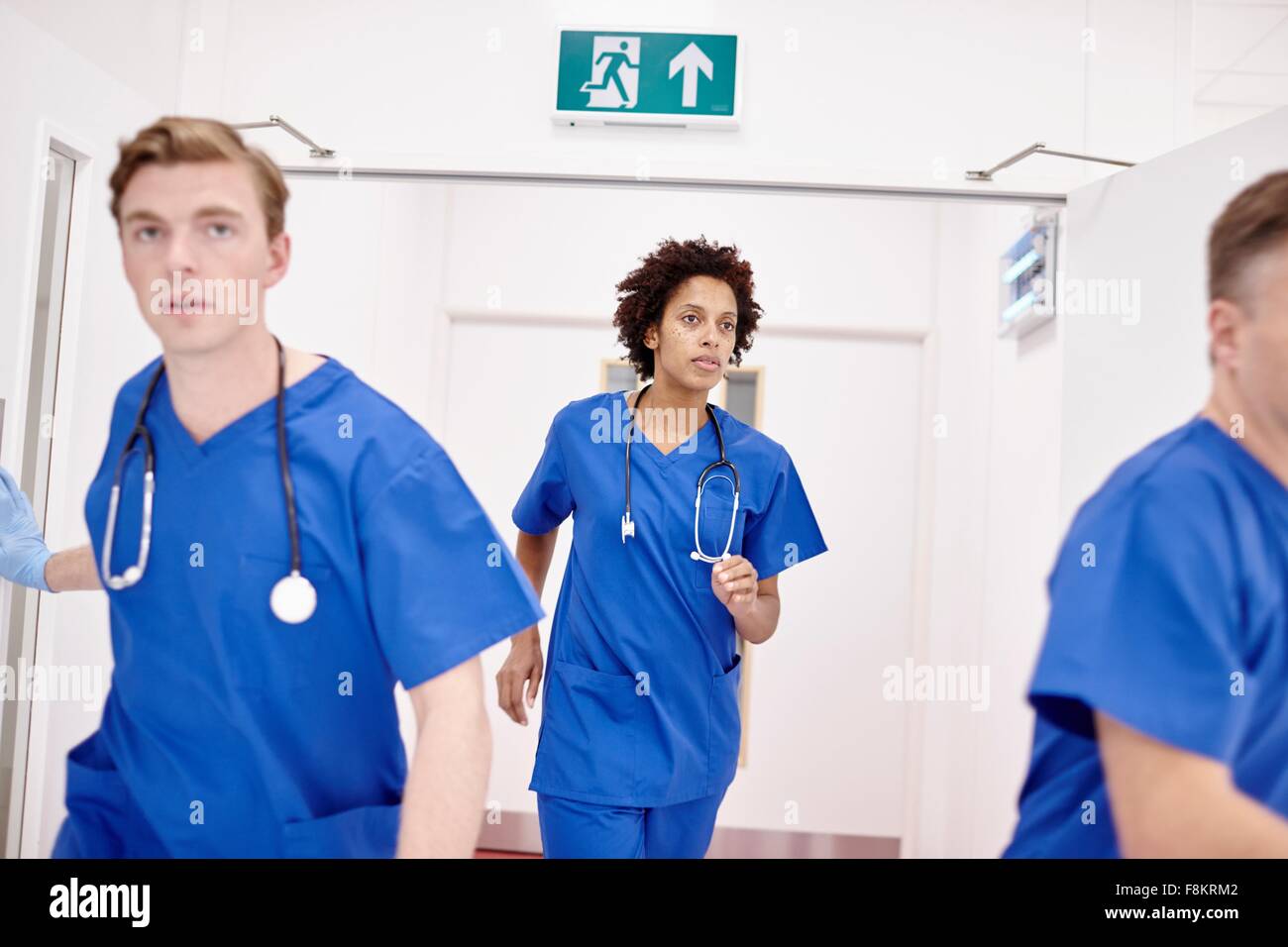 Female male doctors running hi-res stock photography and images - Alamy