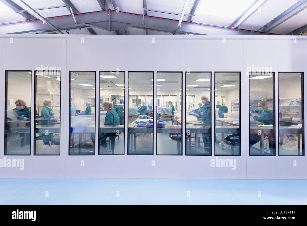 View of workers in clean room in surgical instrument factory Stock ...