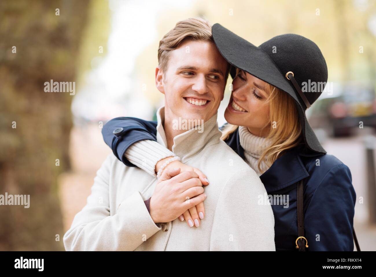 Romantic young couple in park, London, England, UK Stock Photo - Alamy