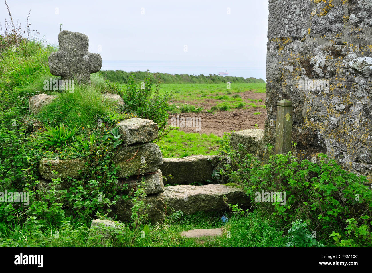 Granite Cross and Stile on footpath in West Penwith, Cornwall Stock ...