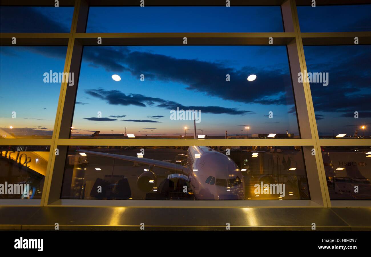 Airport terminal window view of airplane, New York, USA Stock Photo - Alamy
