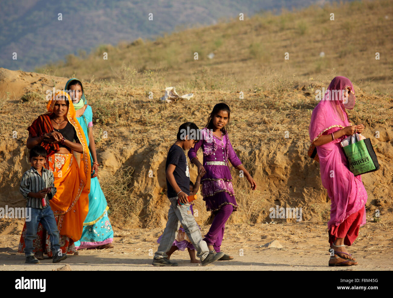 PUSHKAR, INDIA - NOV 28: Indian family walking for going to Pushkar ...