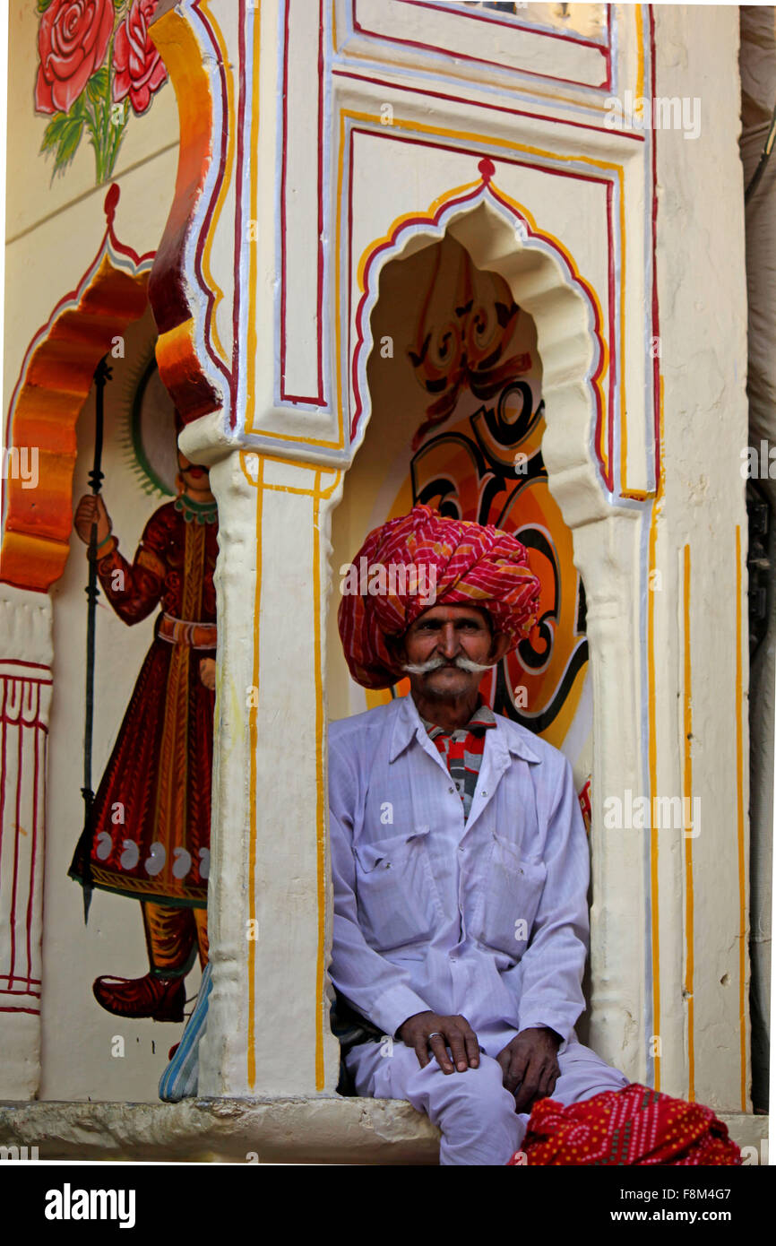 PUSHKAR, INDIA - NOV 28: Indian watchman standing in its position ...