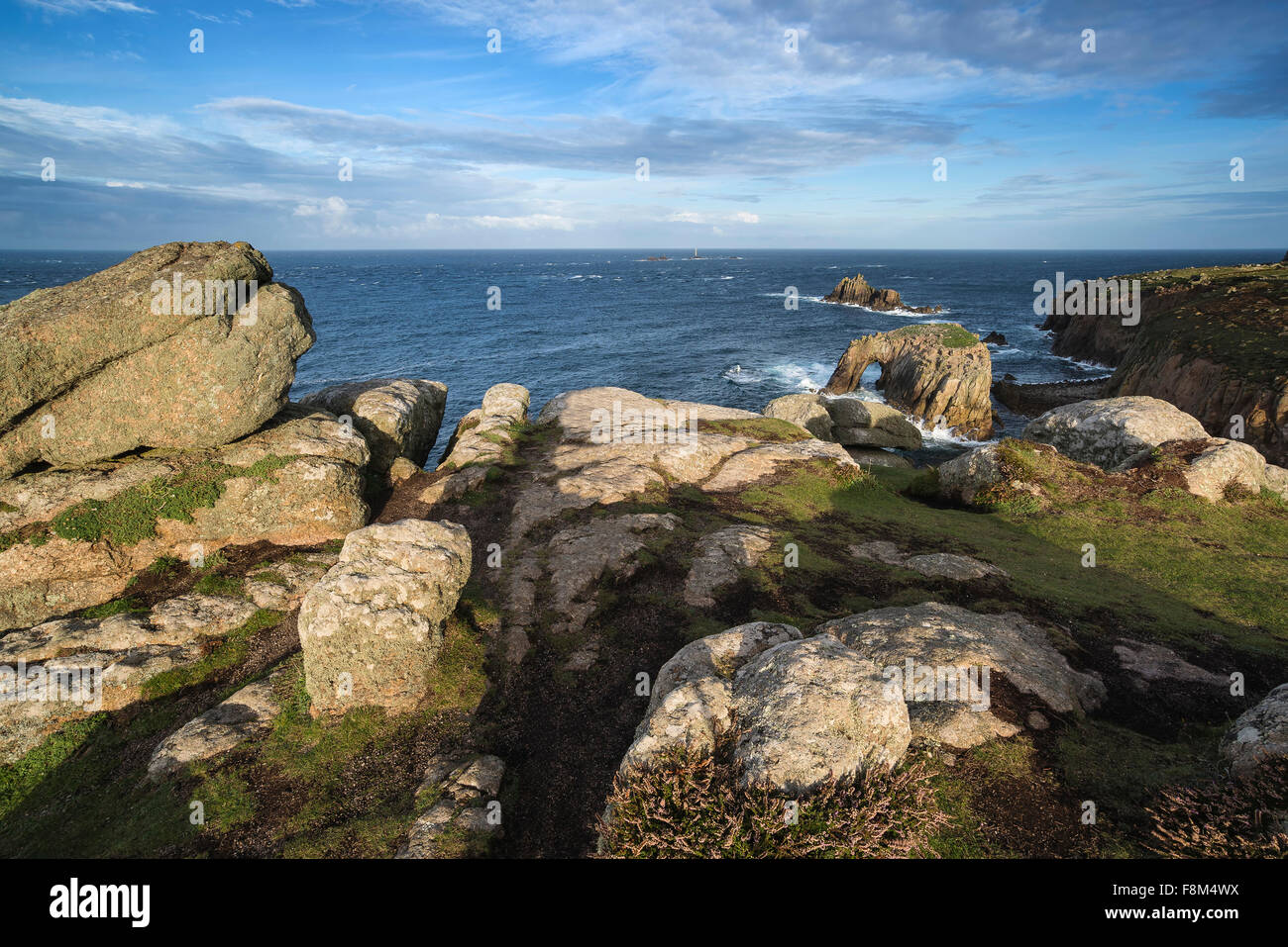 Beautiful sunrise landscape image of Land's End in Cornwall England ...