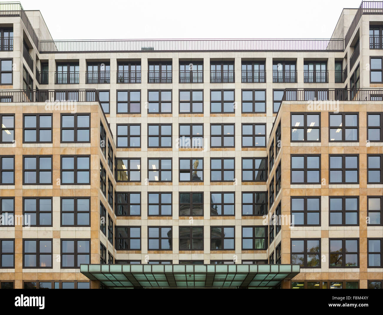 Modern building with Neue Kirche reflected in the windows, Berlin Stock ...