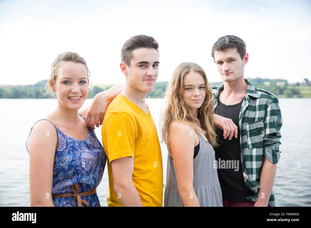 Portrait of group of friends, outdoors, smiling Stock Photo - Alamy