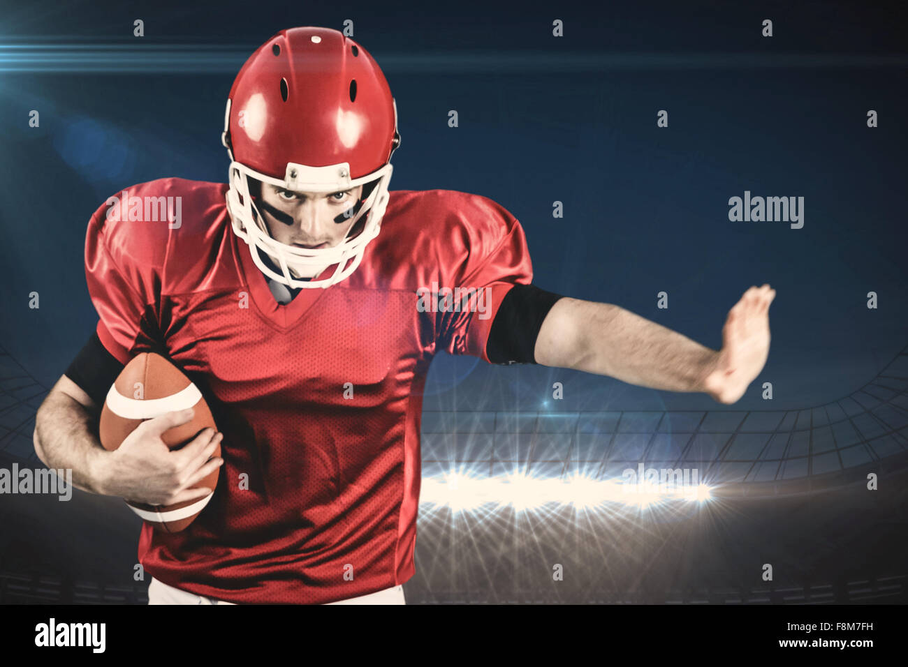 Composite image of american football player wrestling through and ...