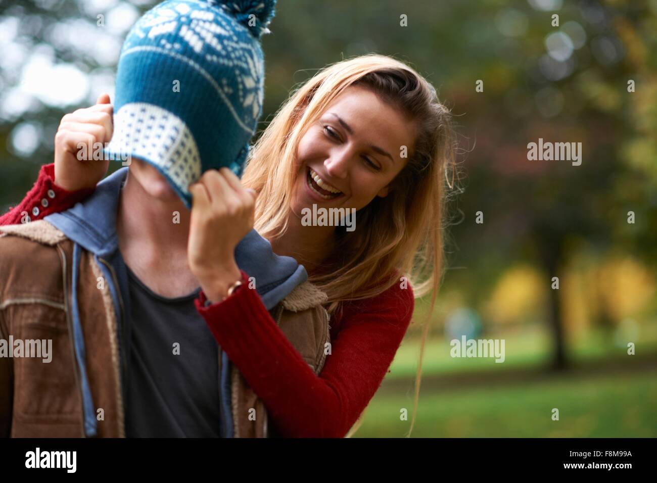 Pulling hat over head hi-res stock photography and images - Alamy