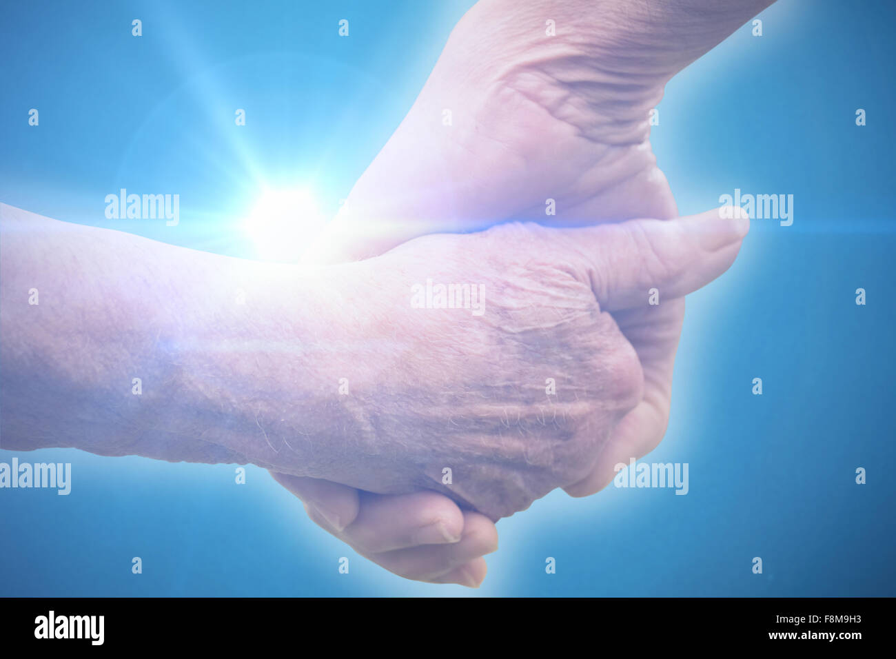 Elderly holding hands hi-res stock photography and images - Alamy