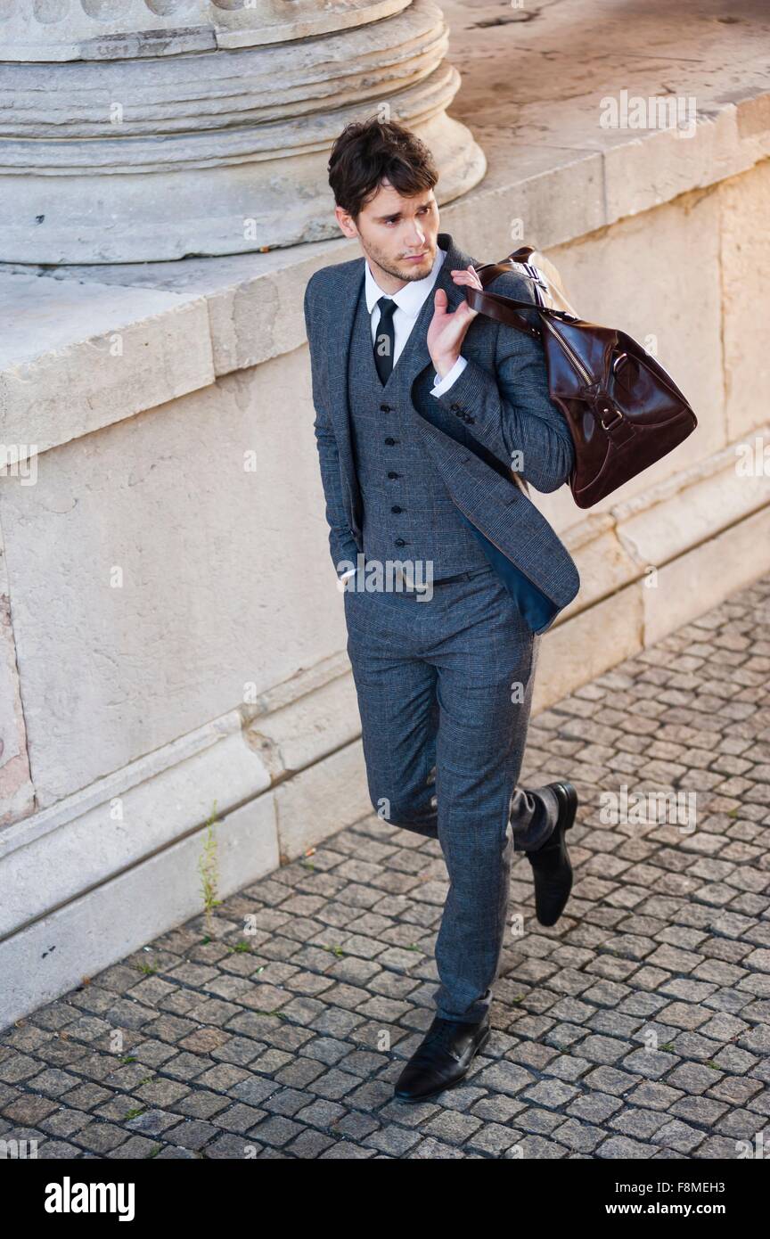 Businessman carrying stone hi-res stock photography and images - Alamy