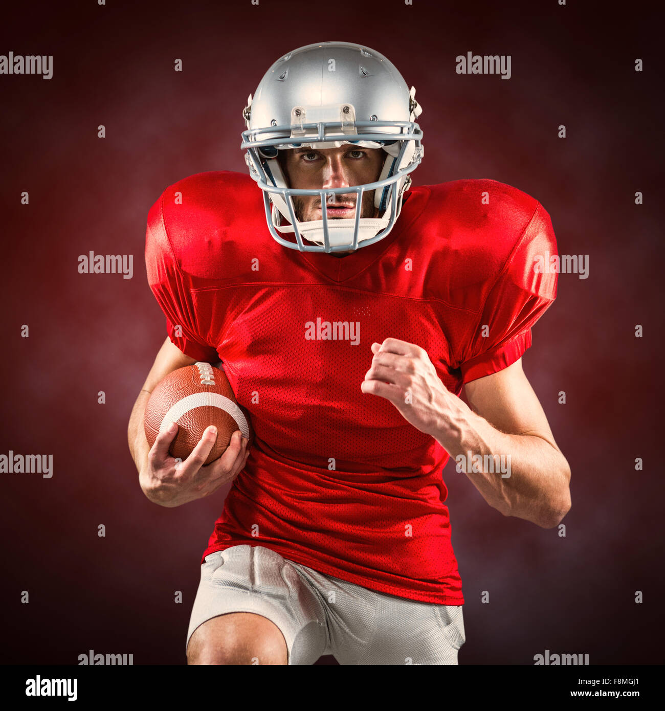 American football player in red hi-res stock photography and images - Alamy
