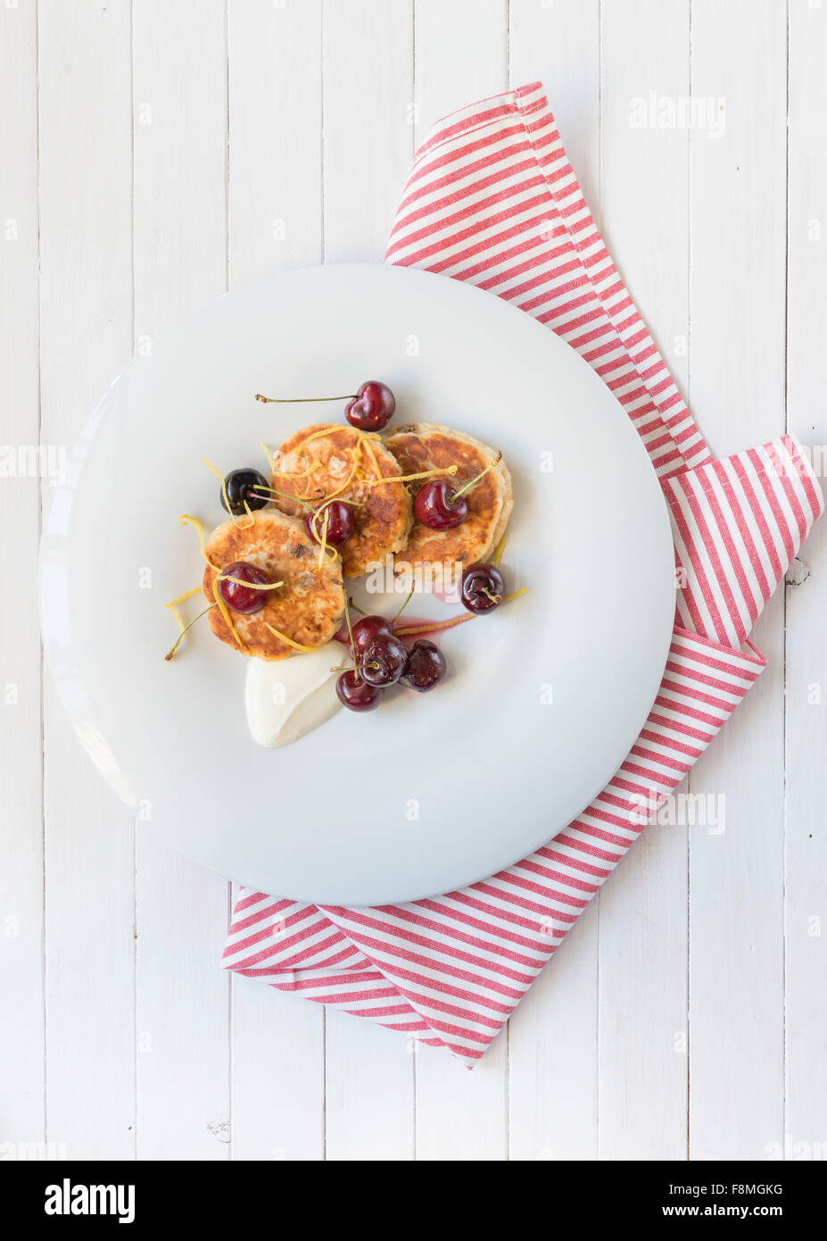 Quark and cream cheese fritters, English summer cherries and creme ...