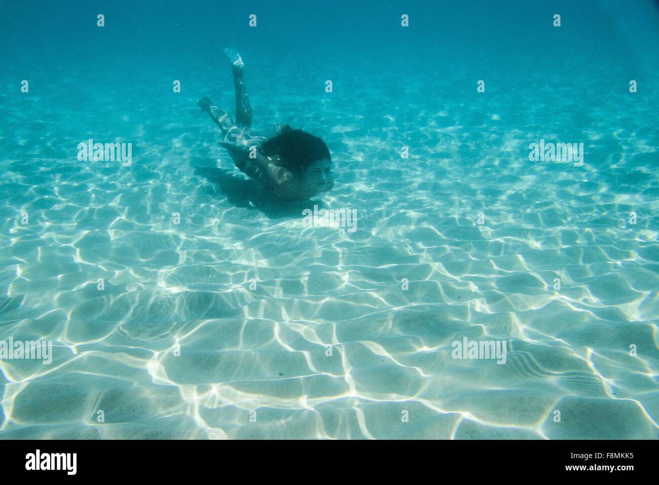 Woman swimming underwater hi-res stock photography and images - Alamy
