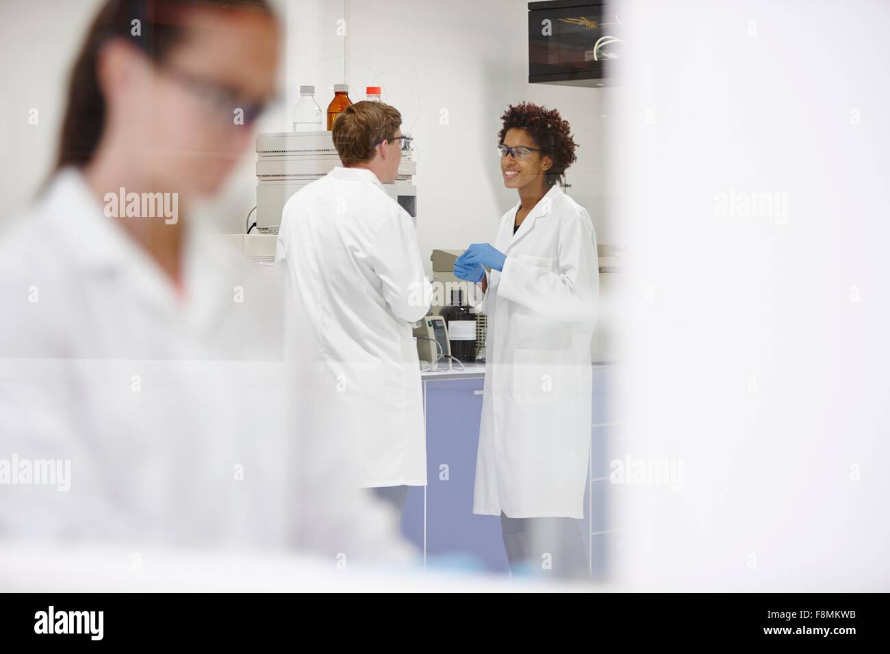 Woman standing laboratory wearing hi-res stock photography and images ...