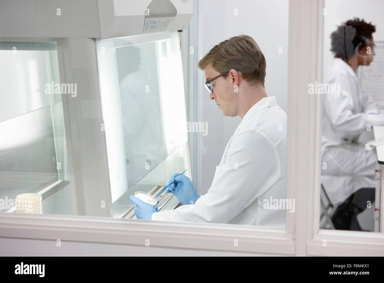 man and woman in laboratory Stock Photo - Alamy