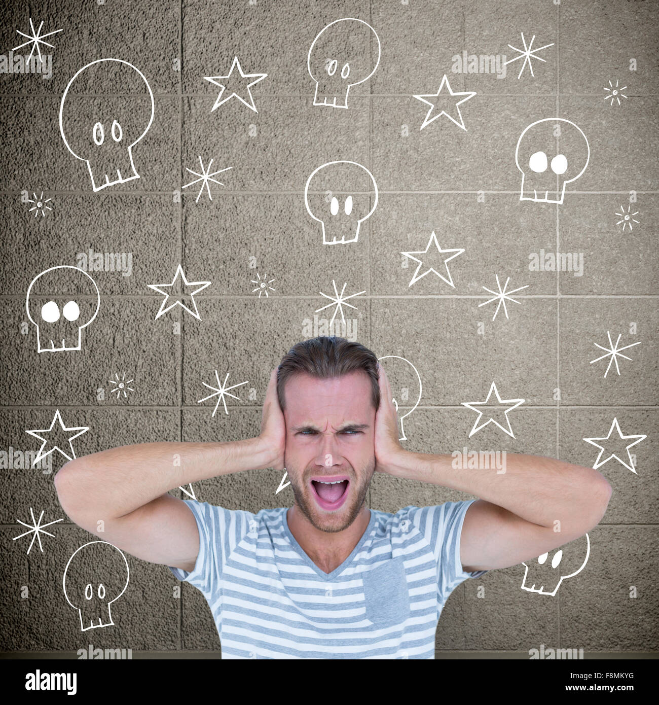 Composite image of handsome man screaming while covering ears Stock ...