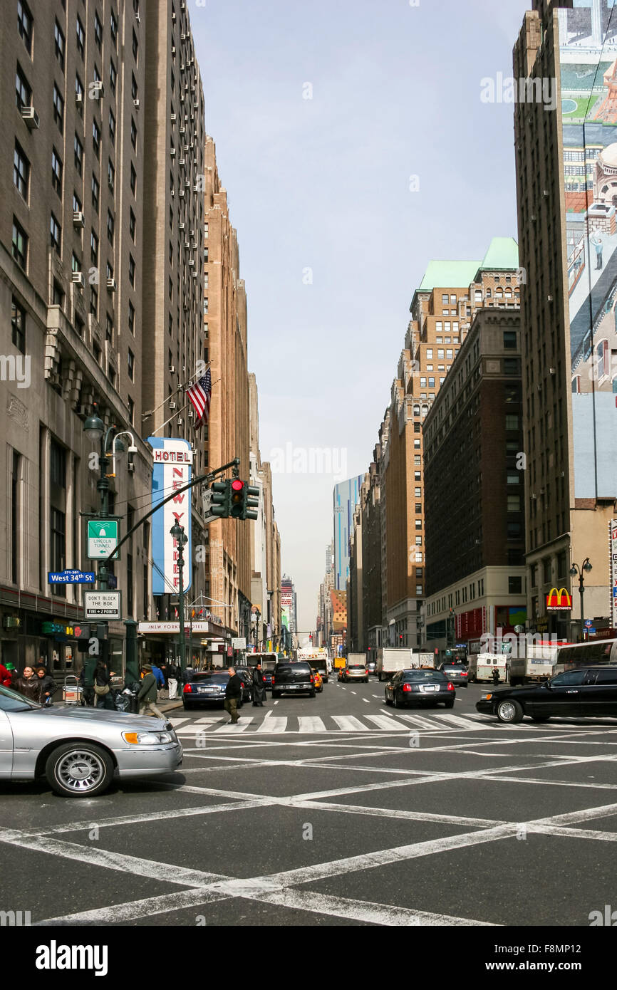 Intersection with traffic of West 34 street and 8th Avenue in Midtown ...