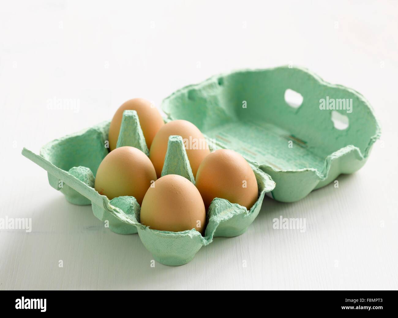 Five eggs in an egg box Stock Photo - Alamy