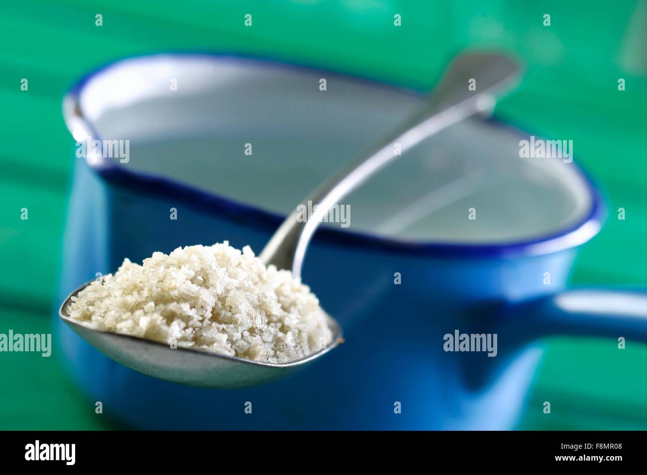 Salt in spoon hi-res stock photography and images - Alamy
