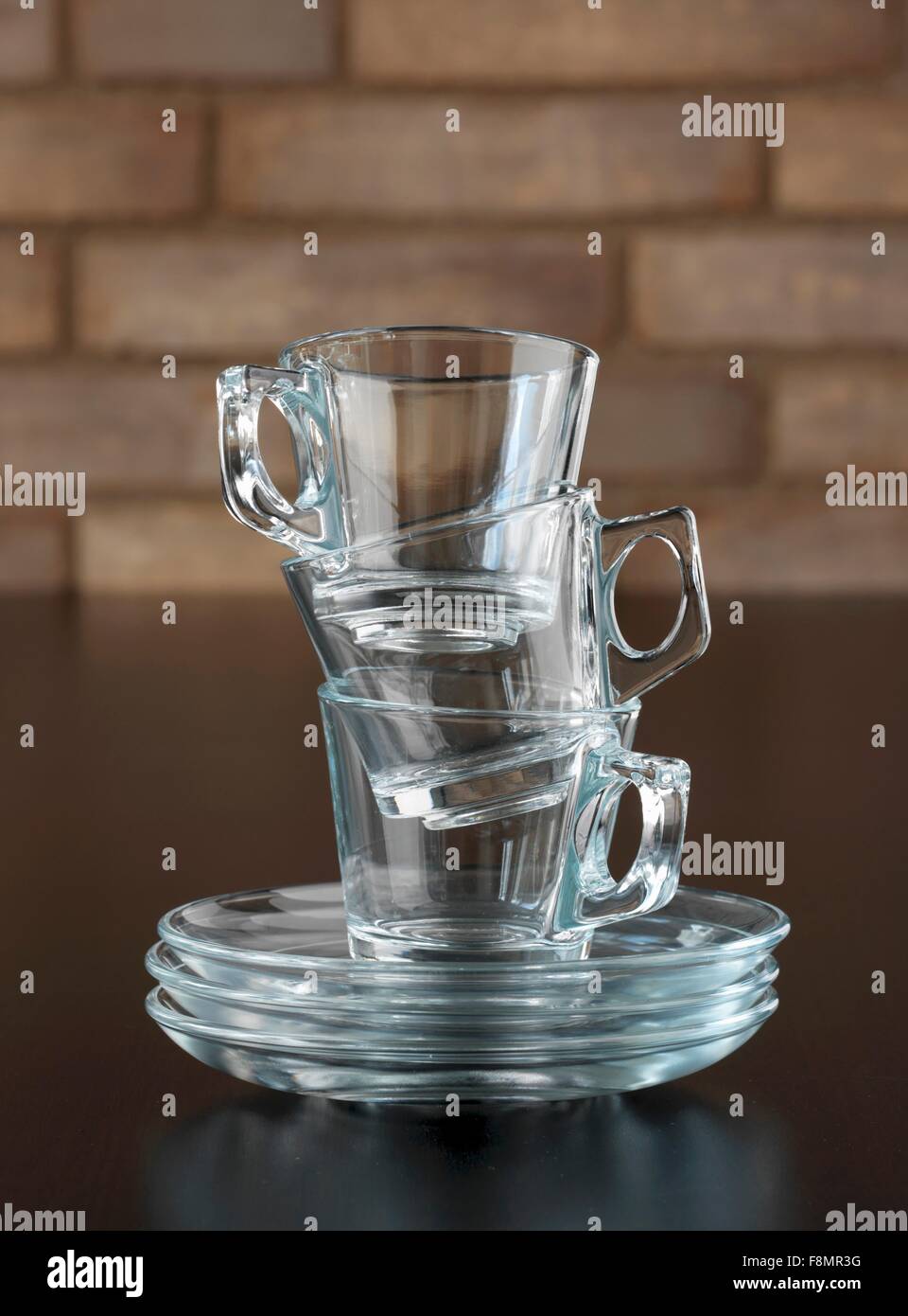 Stacked espresso cups made from glass Stock Photo - Alamy