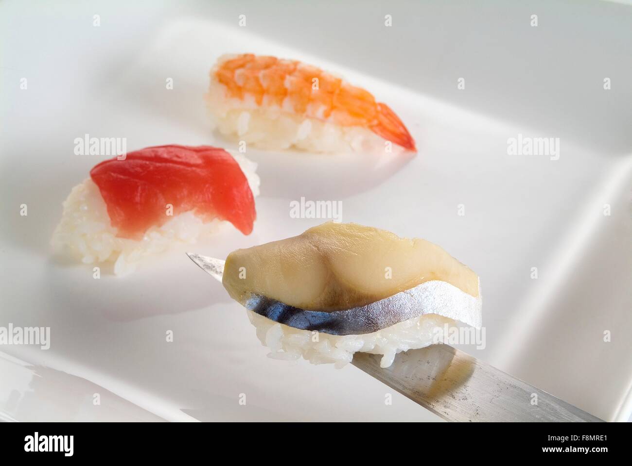 Three nigiri (close-up Stock Photo - Alamy
