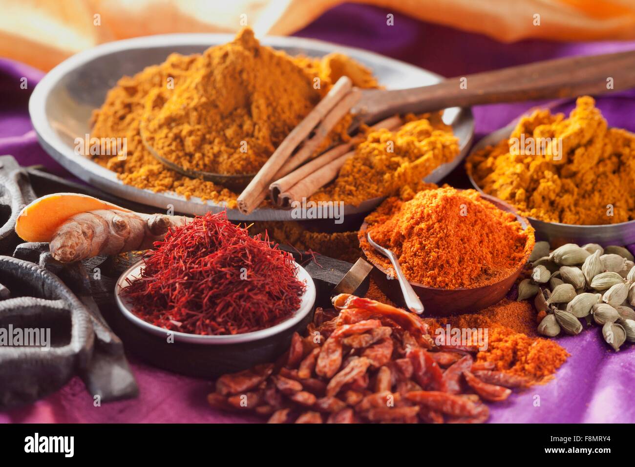 Assorted spices in small containers Stock Photo - Alamy
