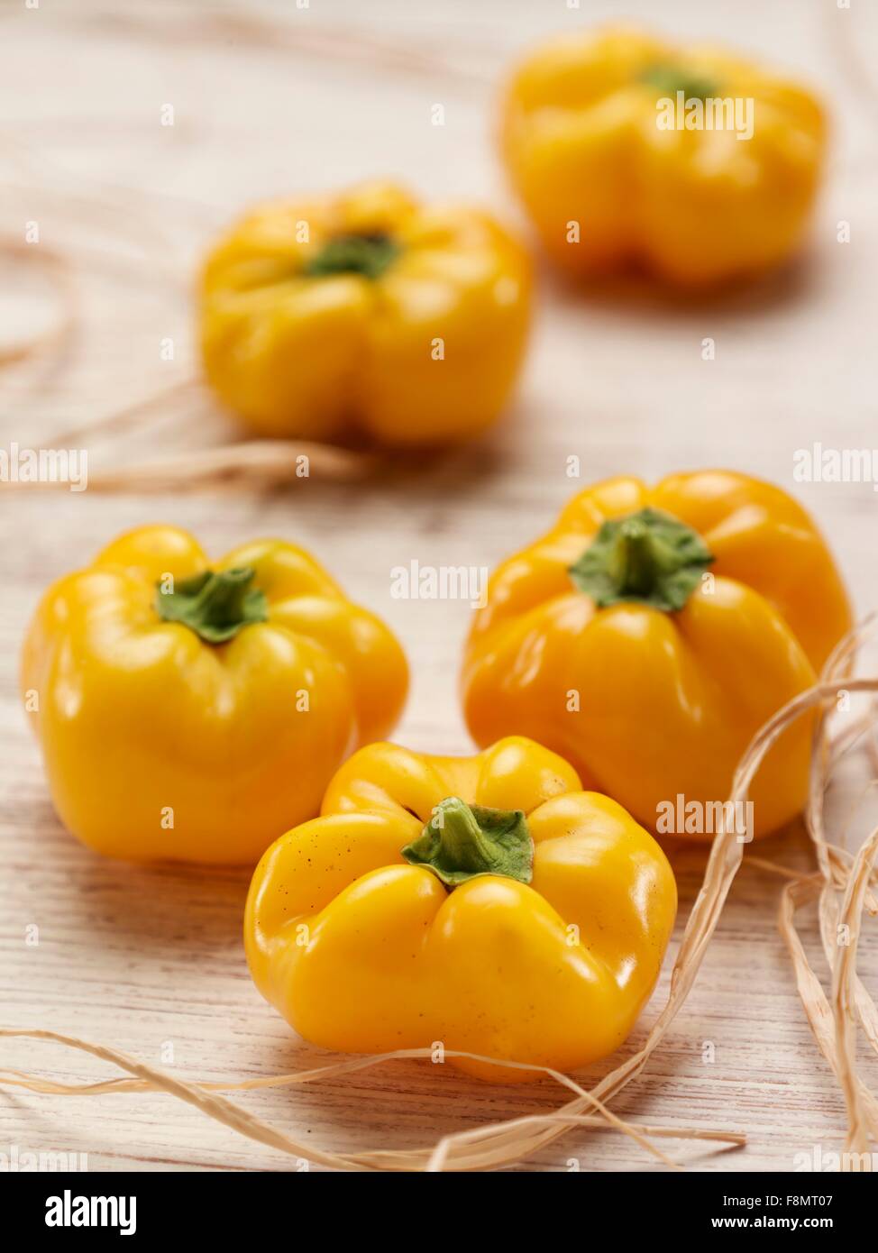 Several yellow peppers Stock Photo - Alamy