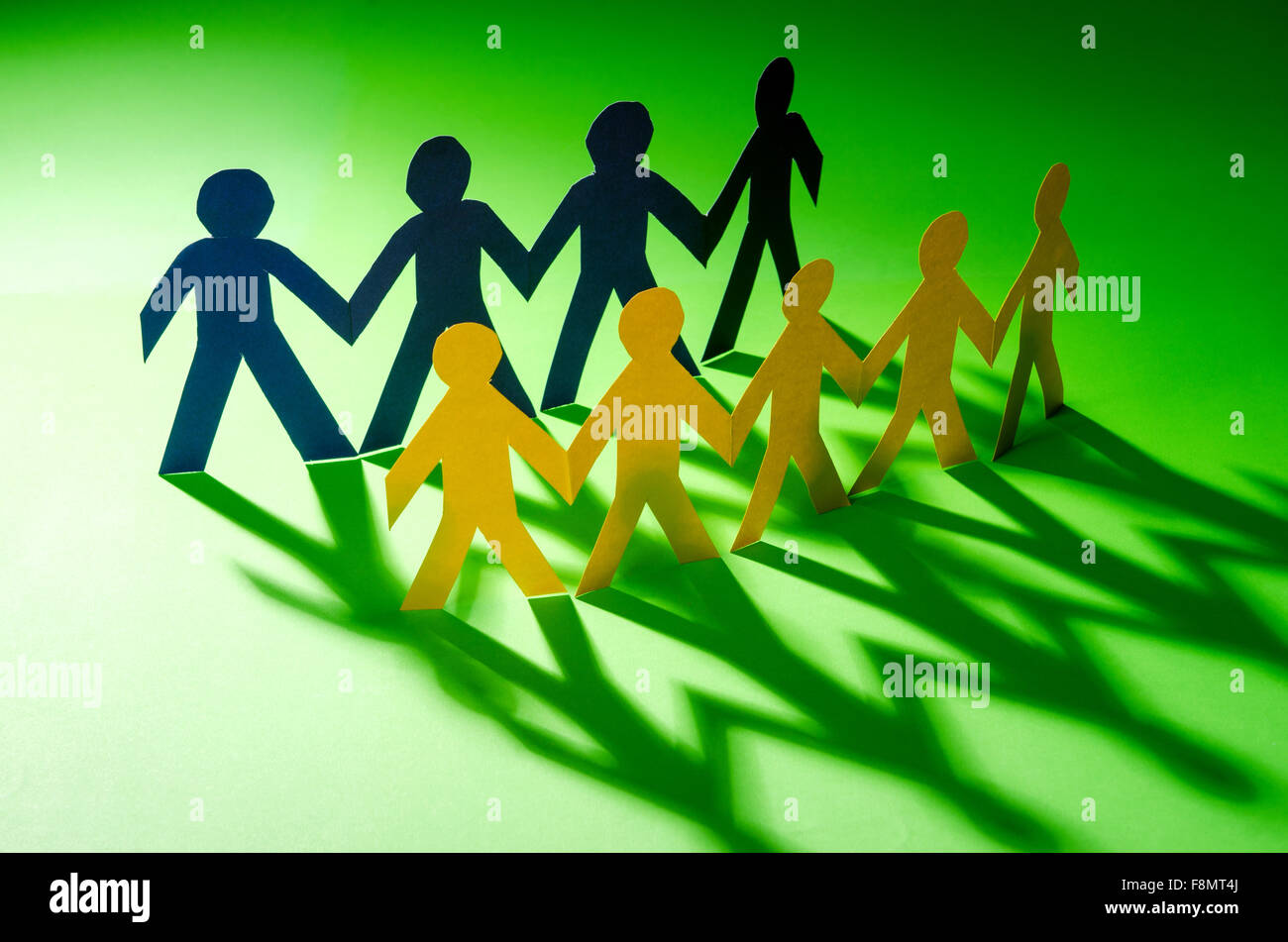 Paper people in teamworking concept Stock Photo - Alamy