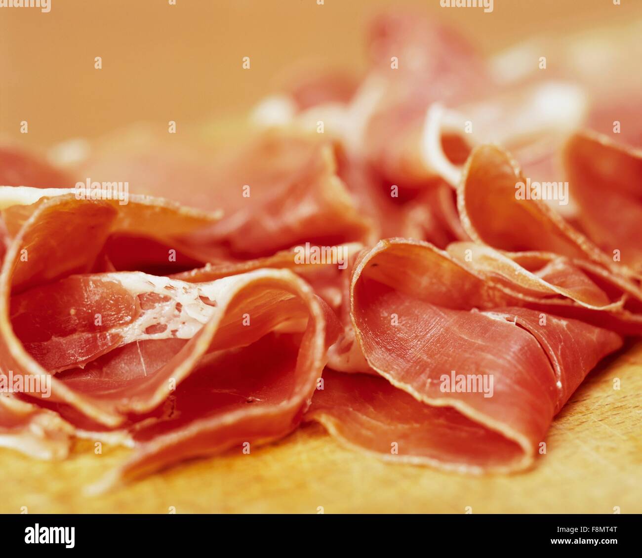 Various slices of raw ham (close-up Stock Photo - Alamy