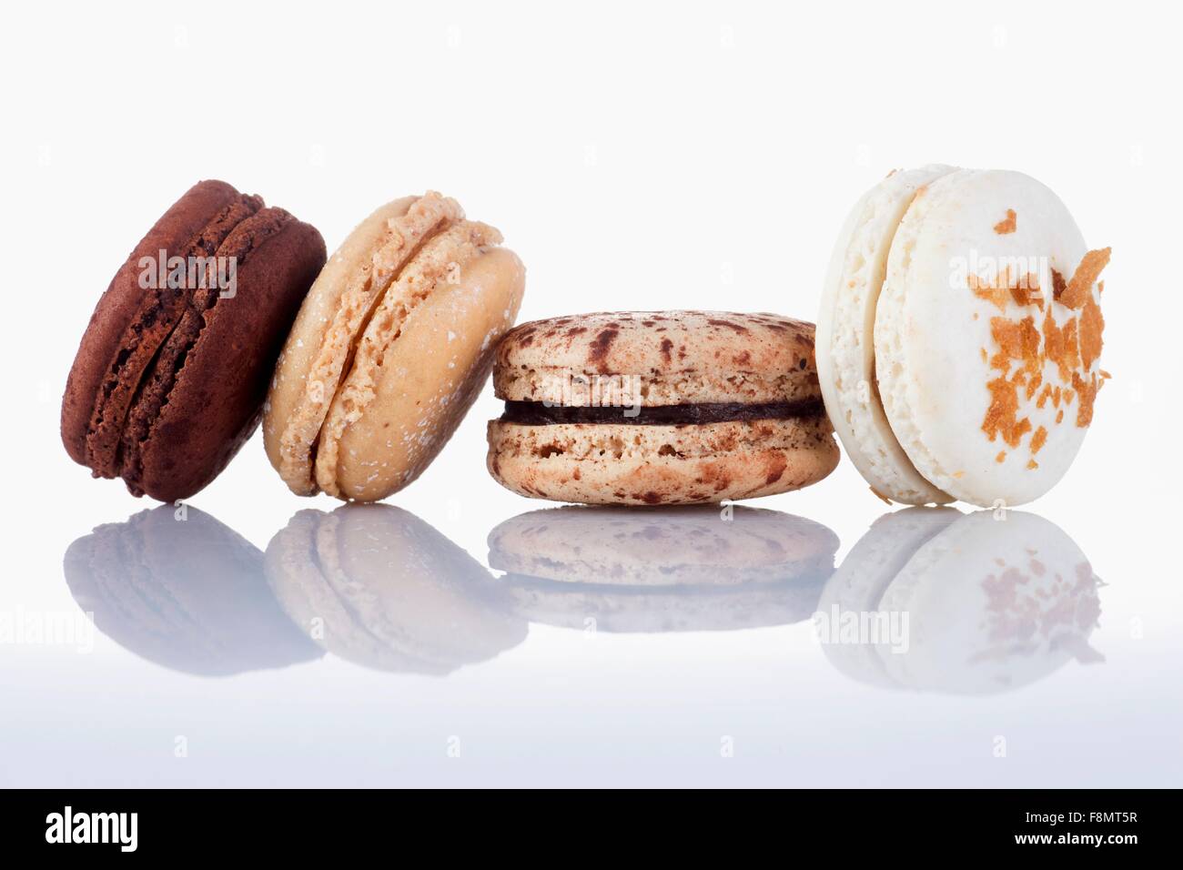 Four different macaroons Stock Photo - Alamy